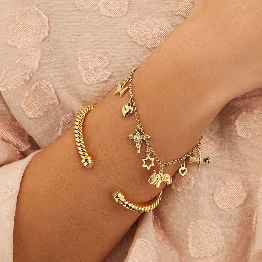 Gold Twirl Bangle with incorporating Rose Quartz Stones